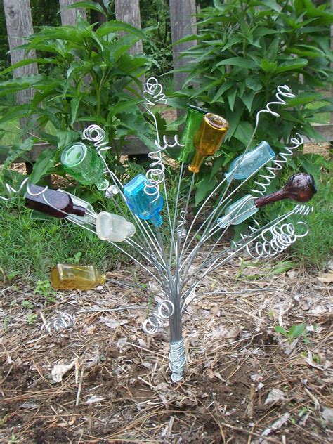 23 Glass Bottle Garden Art Ideas For This Year Sharonsable