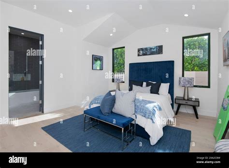 A Neat Tidy Room Set Up For Rest In A Modern New Construction Home In