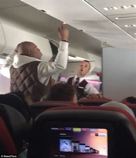 Moment Abusive Passenger Is Dragged Off Virgin Flight Daily Mail Online