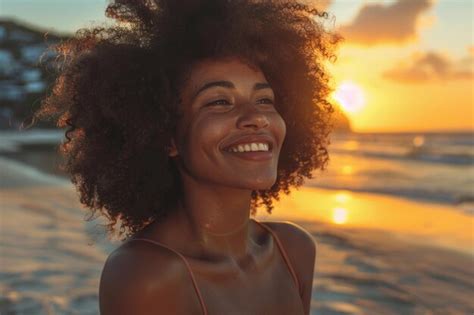 Happy African American Woman Enjoying Sunrise At Beach Premium Ai