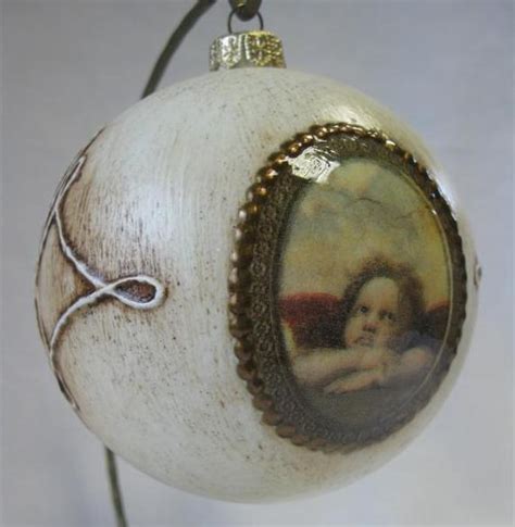 Galeria decoupage bombka decoupage 10cm aniołek leżący