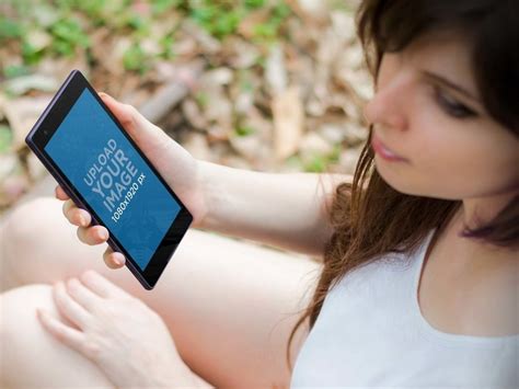 Placeit Mockup Of A Brunette Woman Using An Android