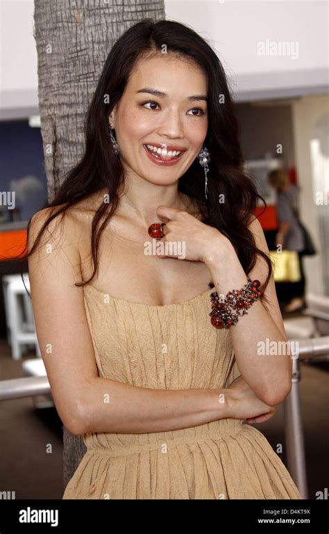 Taiwanese Actress Shu Qi Poses During The 62nd Cannes Film Festival At Hotel Majestic Beach In