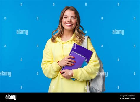 Cheerful Pretty Blond Girl Smiling At Camera Carry Backpack And