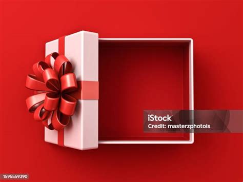빈 흰색 선물 상자 열기 또는 그림자 최소한의 개념적 3d 렌더링과 함께 짙은 빨간색 배경에 격리된 빨간색 리본 활로 묶인 흰색 선물 상자의 위쪽 보기 상자에 대한 스톡