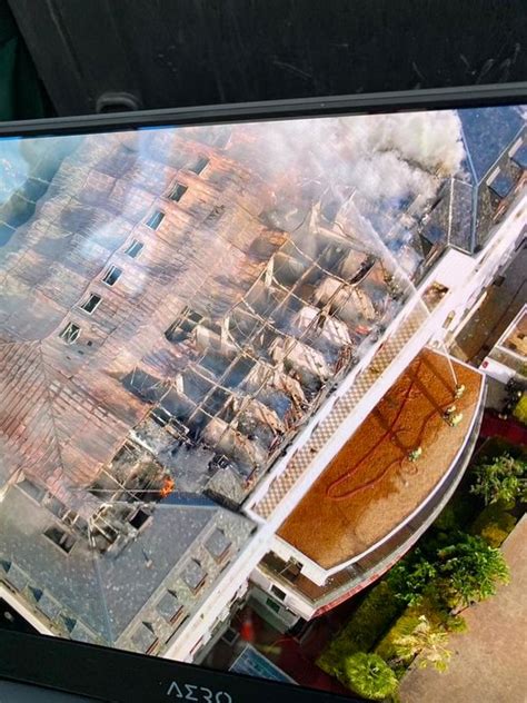 Aerial Footage Shows National Assembly Roof Alight Firefighters