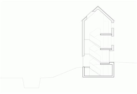 Blackened Timber House By Bernardo Bader Is On The Edge Of A Stream