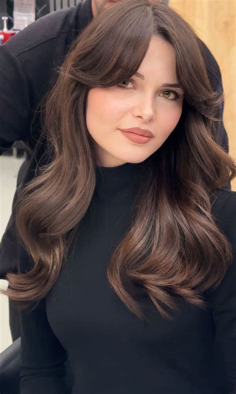 Long Layered Hair With Curtain Bangs In Cocoa Brown