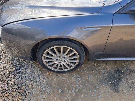 ALFA ROMEO BŁOTNIK PRZEDNI LEWY KOLOR A oficjalne archiwum Allegro
