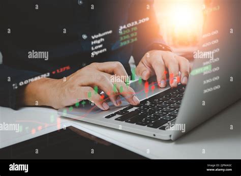 Business Using Computer Laptop And Analysing The Financial Data Graph Diagram Interface Virtual