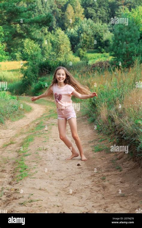 Beautiful Preteen Girl Enjoying Her Time Outside In P
