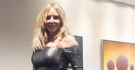 Carol Vorderman Stuns In Ultra Clinging Silver Gown With Very Daring