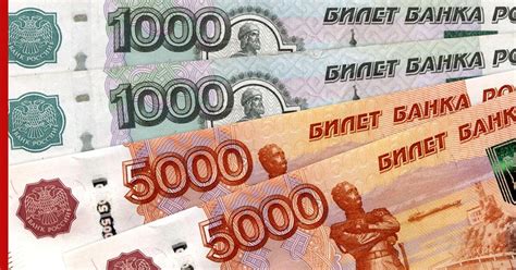 Центральный банк РФ летом представит модернизированные банкноты в 1000 и 5000 рублей
