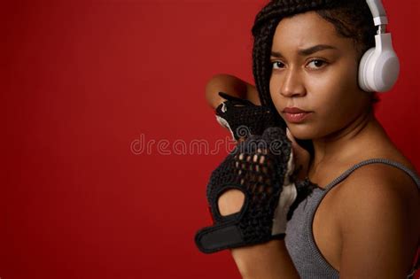 African Athletic Woman With Perfect Physique Boxer In Red Boxing
