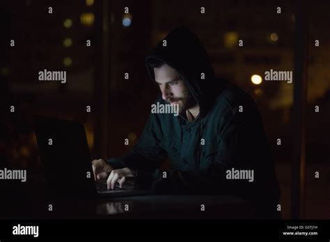 Hacker Using A Laptop Stock Photo Alamy