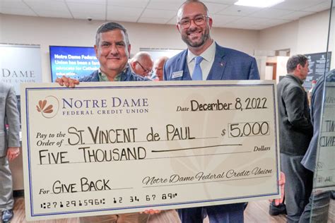 Notre Dame FCU Phoenix Branch Hosts Ribbon Cutting And Rite Of Blessing