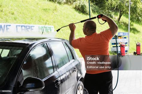 Washing And Cleaning Car In Self Service Car Wash Station Car Washing