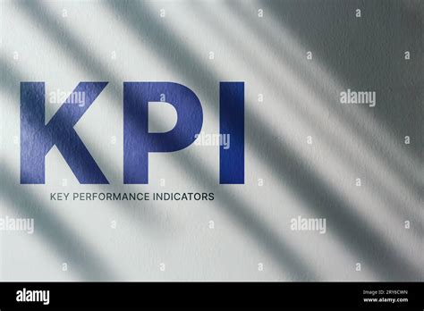 White Wall With Moody Shadows And Kpi Word On It And Copy Space Key