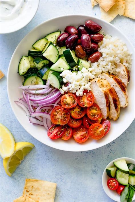 Greek Chicken Bowls Are Made With Lemon Oregano Chicken Rice Tomatoes Cucumber Olives Feta