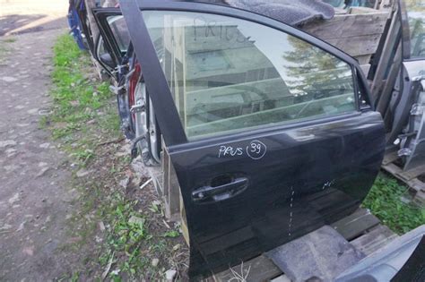 TOYOTA PRIUS II DRZWI PRAWE PRZEDNIE 202 SZYBA 12710530094