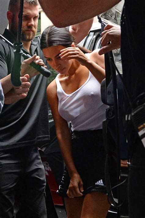 Kim Kardashian Goes Bra Free In Sheer White Tank Top