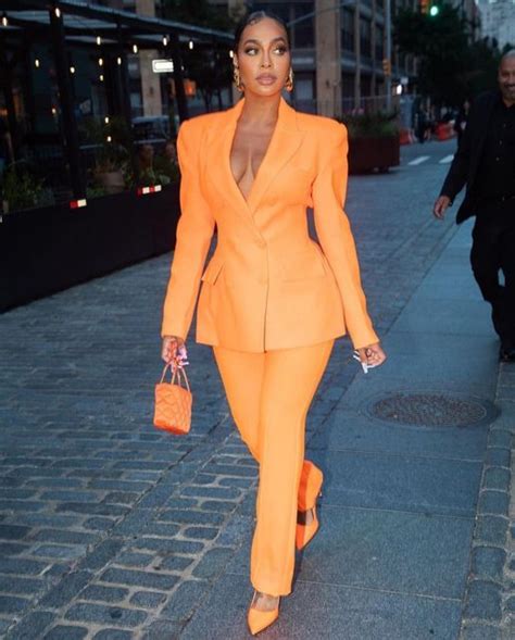 Stylishflychick On Instagram 𝘓𝘈𝘓𝘈 𝘓𝘰𝘰𝘬𝘴 𝘋𝘪𝘷𝘪𝘯𝘦 𝘐𝘯 𝘛𝘩𝘪𝘴 𝘙 𝘈𝘕𝘎𝘌 𝘚𝘶𝘪𝘵🗣🧡🔥