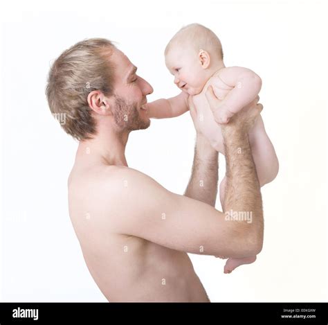 Father Holding His Naked Baby In Her Arms White Background Stock Photo Alamy