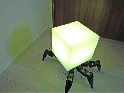 this creepy spider night light robot will crawl around your house at night