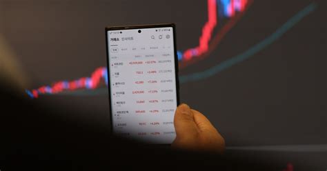 바이낸스 ‘악재 털어낸 비트코인 5000만원대서 ‘관망세