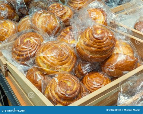 Freshly Baked Crispy Bread Buns On A Counter Or Shelf In A Store Close