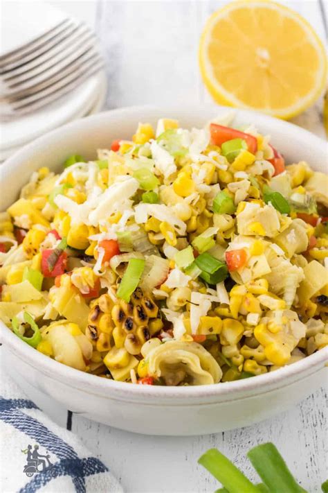 Zesty Italian Charred Corn Salad With Artichokes And Cheese