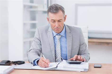 Premium Photo Concentrated Businessman Working In His Desk