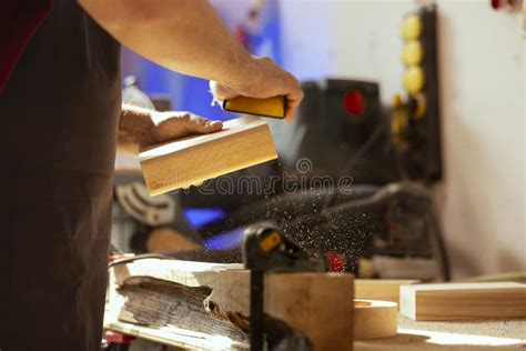 Craftsperson Sanding Piece Of Wood Enjoying Diy Hobby Close Up Stock