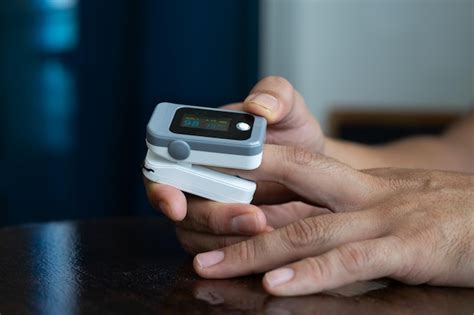 Premium Photo Pulse Oximeter Used To Measure Pulse Rate And Oxygen Levels