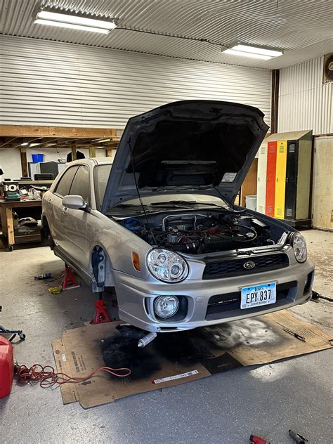 i finally finished fully sti swapping my dads 02 wagon r wrx