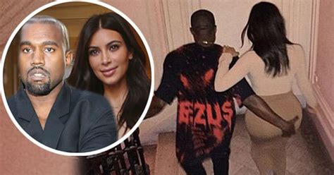 New Photo Shows Kanyes In Kontrol Of Kims Famous Booty Rapper Grabs