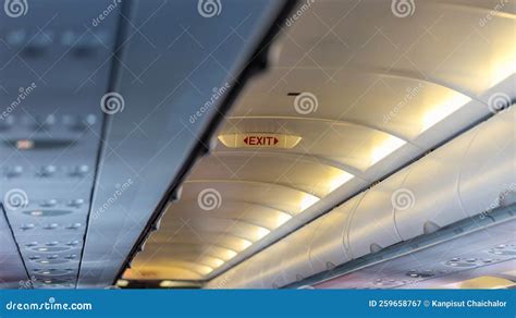Exit Sign In Passenger Airplane Emergency Exit Sign On Airplane Stock Image Image Of Cabin