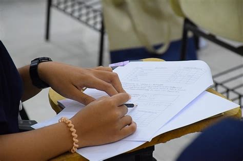 Premium Photo Midsection Of Woman Filling Form