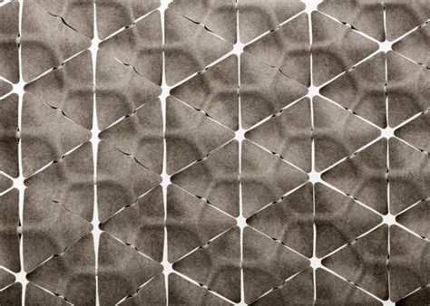 Layer Uses Large Hemp Tiles To Create Scale Partition System