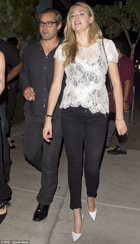 Celebrities Club Kate Upton Puts On A Leggy Display In White Denim