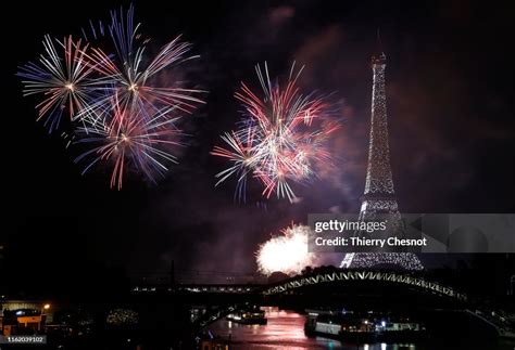 Fireworks Burst Around The Eiffel Tower As Part Of Bastille Day News