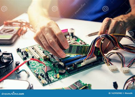 Computer Assembly Technician Install Ram Memory Module On Motherboard