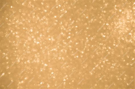 Золотые блестки фона мерцающие размытие точечные огни Боке Блестящий золотой светлый фон