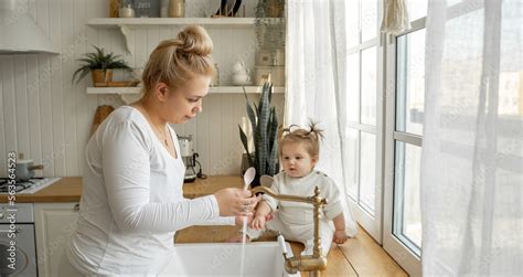 Mother Routine At Home During Maternity Leave Mom Wash Dishes After