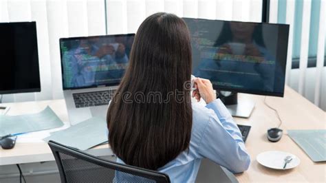 Asian Woman Programming Working With Computer And Typing Data Code To