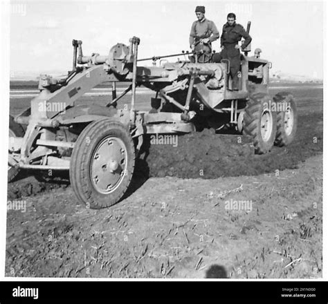 Advanced Aerodrome Construction Motor Grader At Work Preparing Runway