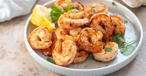 Recette Crevettes sautées à lail citron et herbes fraîches g