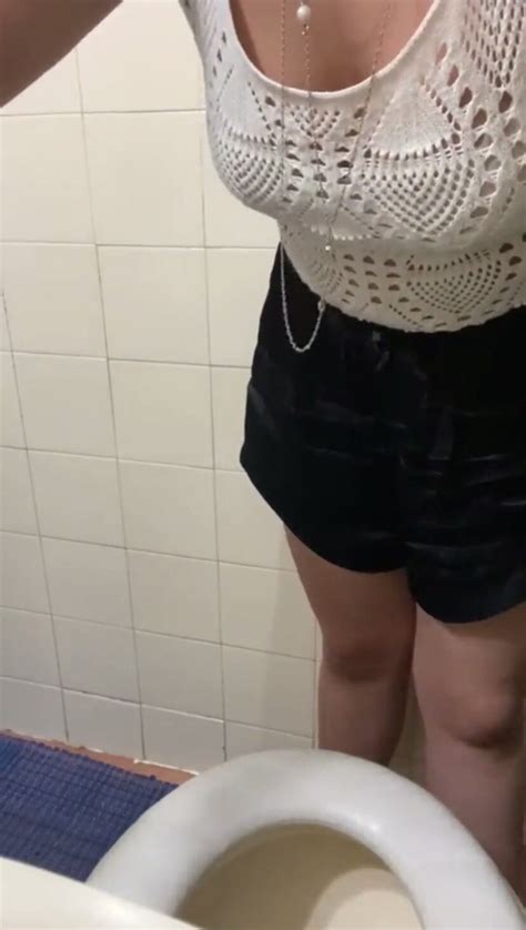 toilet drunk girl puking in her toilet so…