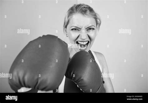 Boxing Improve Temper And Will Woman Boxing Gloves Focused On Attack