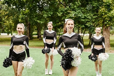 Cheerleading Girls Performing Together Outdoors Stock Image Image Of